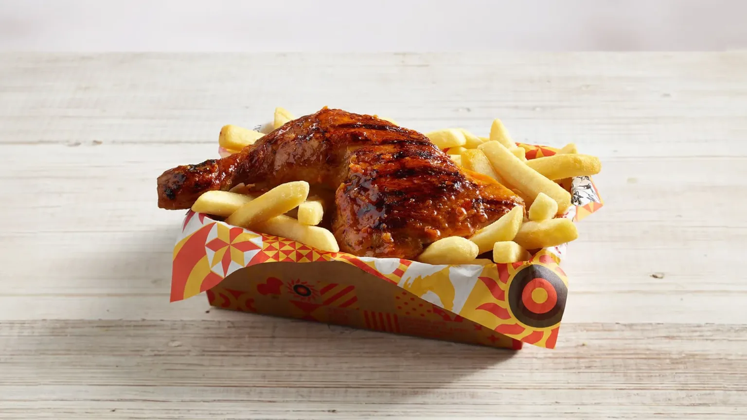 Quarter Flame Grilled Chicken and Chips - Oporto Menu